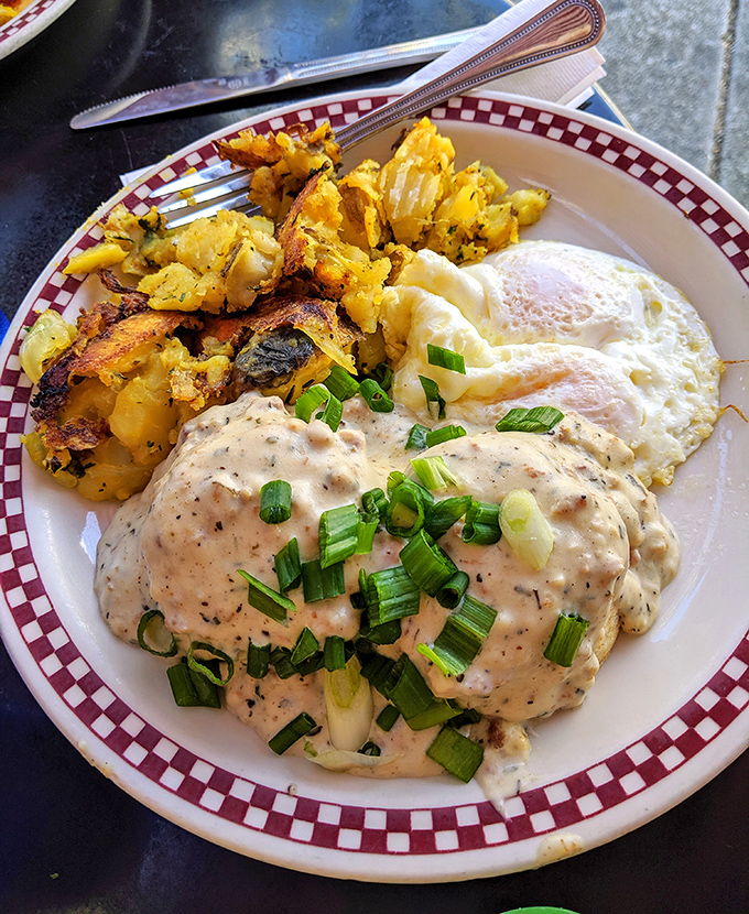 Not just biscuits and gravy&mdash;it's a golden-crisp potato symphony with eggs and a creamy sauce that would make your grandmother both jealous and proud.