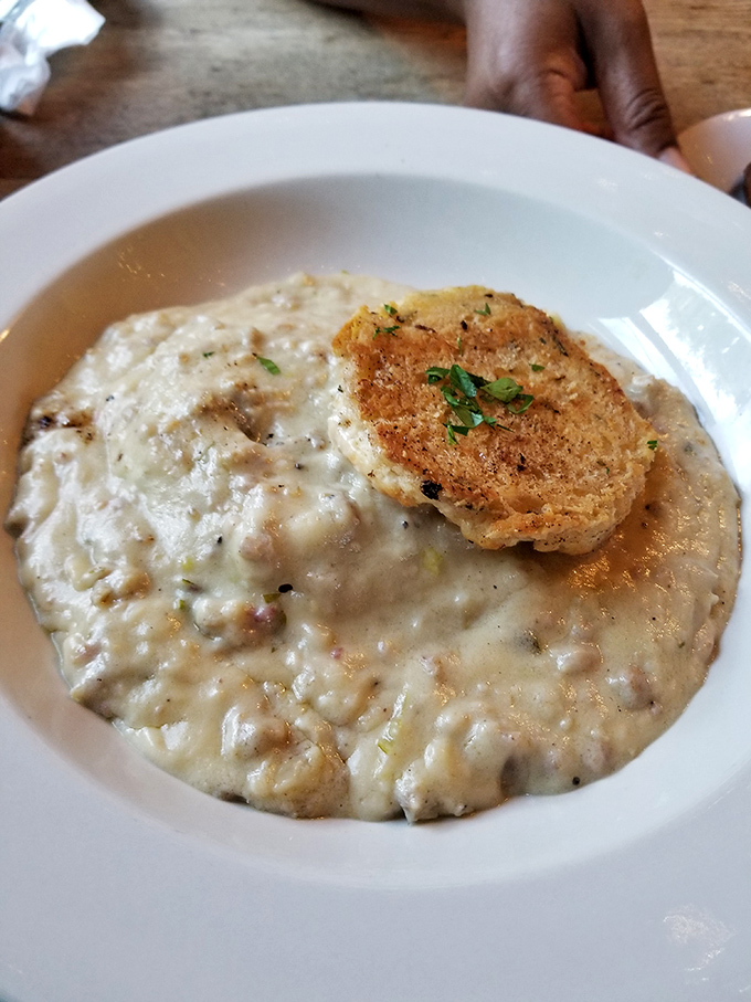 Biscuits and gravy that would make your Southern grandmother nod in approval. That golden biscuit perched atop creamy gravy is begging for a close-up.