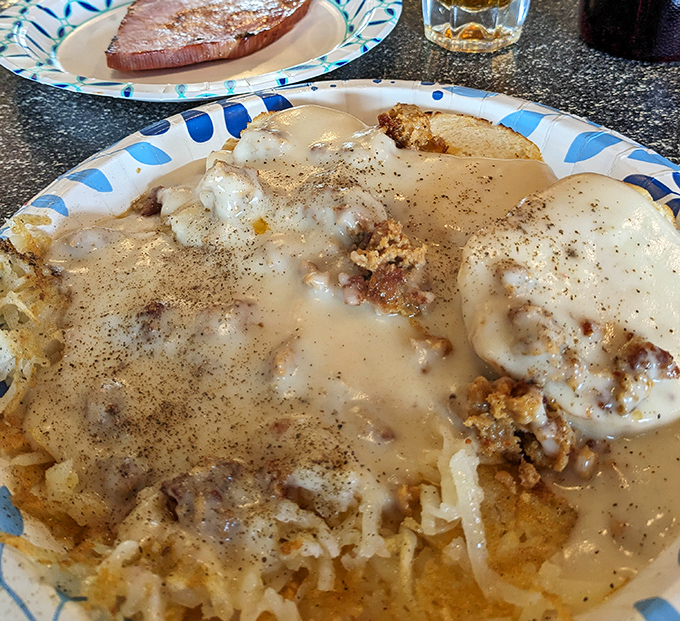 Biscuits and gravy at Nadine's isn't just a dish, it's an edible hug &ndash; comfort food that whispers "everything's gonna be alright" with every savory bite.