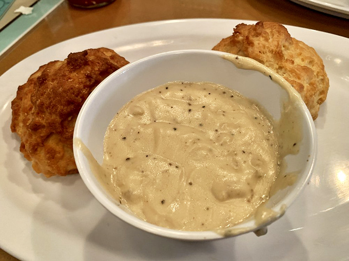 Biscuits and gravy: the ultimate comfort food marriage. These fluffy clouds swimming in peppery cream gravy might just make you speak with a temporary Southern accent.