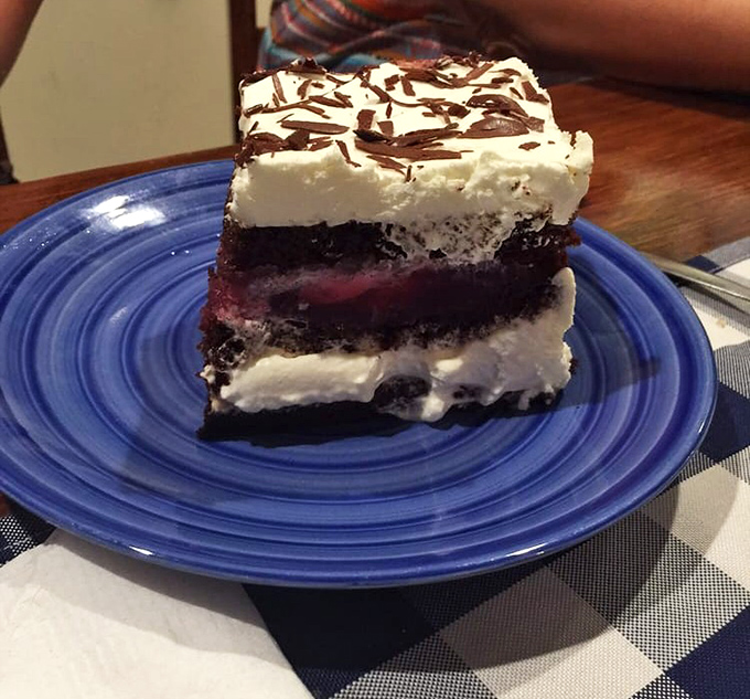 The Black Forest cake arrives like a celebrity&mdash;layers of chocolate, cream, and cherries performing a perfect harmony that would make the Black Forest itself proud. 