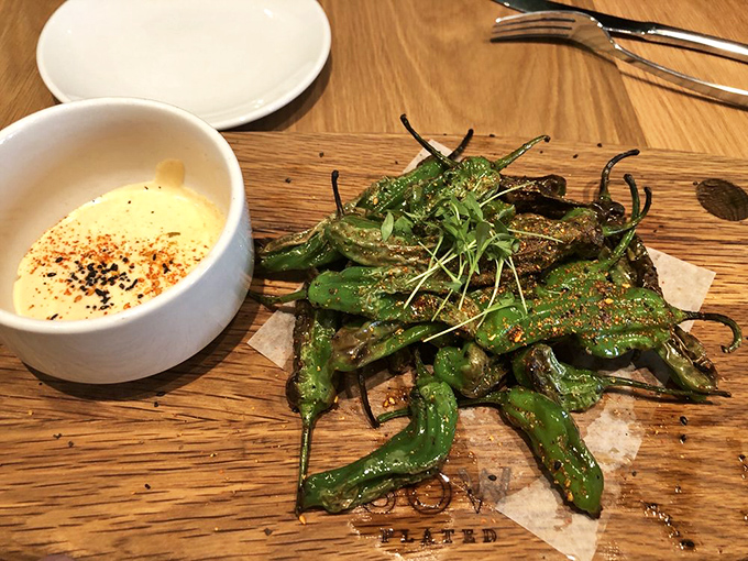 These blistered shishitos come with a creamy dipping sauce that'll make you forget about boring appetizers.