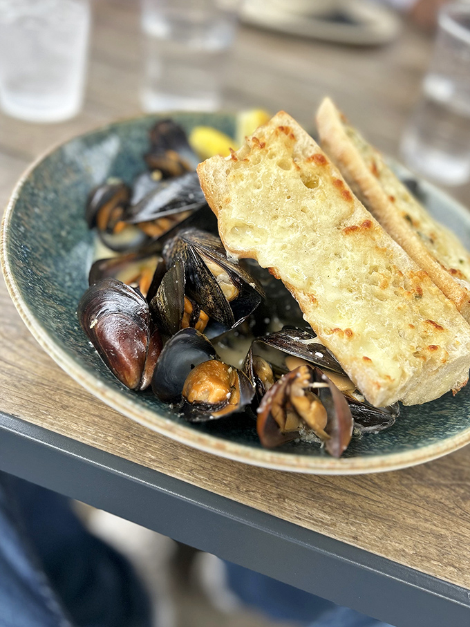 These mussels aren't just seafood&mdash;they're little navy-blue vessels of joy, swimming in a broth you'll want to drink straight from the bowl.