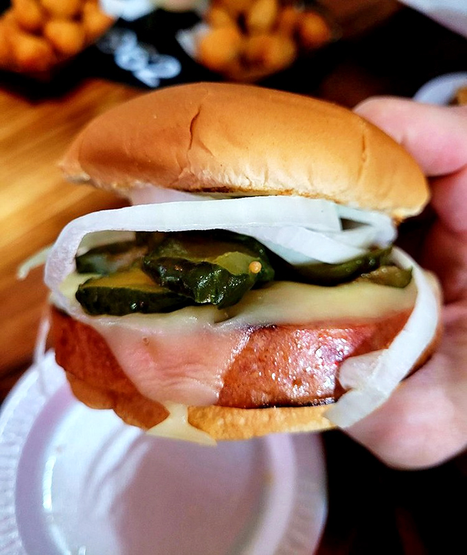 The famous bologna sandwich in all its glory&mdash;thick-cut, perfectly fried, with pickles and onions. Childhood lunch, all grown up and magnificent.