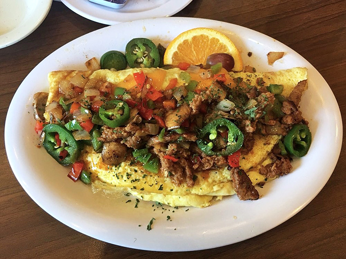 This isn't just an omelet&mdash;it's a flavor explosion with jalape&ntilde;os standing guard like spicy sentinels over a kingdom of chorizo and cheese.