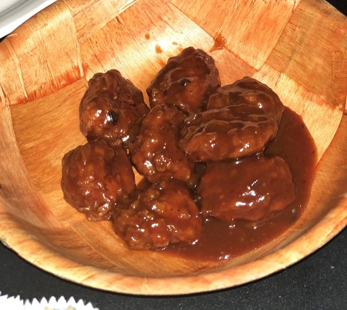 These aren't just wings&mdash;they're glistening flavor bombs swimming in sauce that demands to be licked from fingers, napkins be damned.