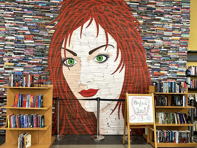 This stunning portrait created entirely from book spines proves that sometimes the best stories aren't between covers, but are the covers themselves.