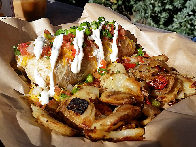 Breakfast potatoes that could make a hash brown weep with inadequacy, topped with enough fixings to qualify as a complete food group.