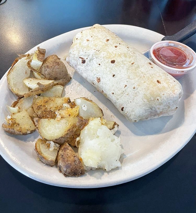 Breakfast burritos should always be this plump and promising. Wrapped with care and served with home fries that look like they've been kissed by butter.