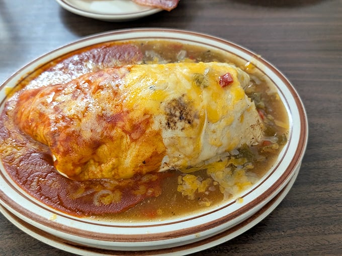 The breakfast burrito at Vic's doesn't just arrive at your table &ndash; it makes an entrance, dressed in red chile and melted cheese.