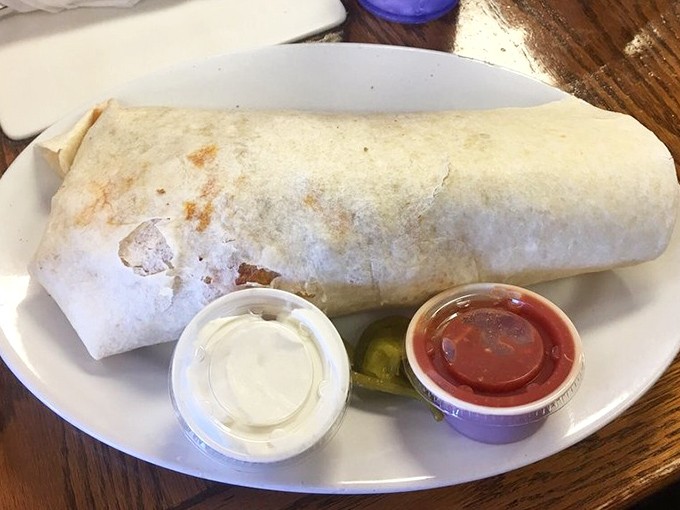 This breakfast burrito isn't just big—it's the kind of commitment that requires both hands and possibly a signed waiver.