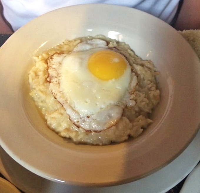 Breakfast risotto topped with a perfectly fried egg&mdash;because sometimes the best way to start your day is with dinner.