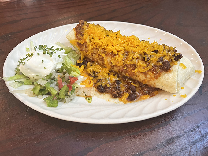 This breakfast burrito isn't just a meal&mdash;it's an architectural achievement, layered with beans, cheese, and spices that would make your morning commute worthwhile.