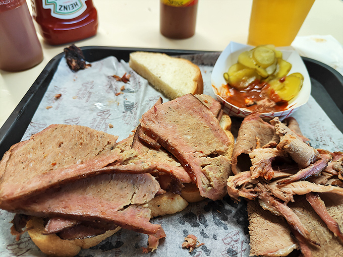 Brisket so tender it practically surrenders on your plate. That pink smoke ring is the barbecue equivalent of a Michelin star.