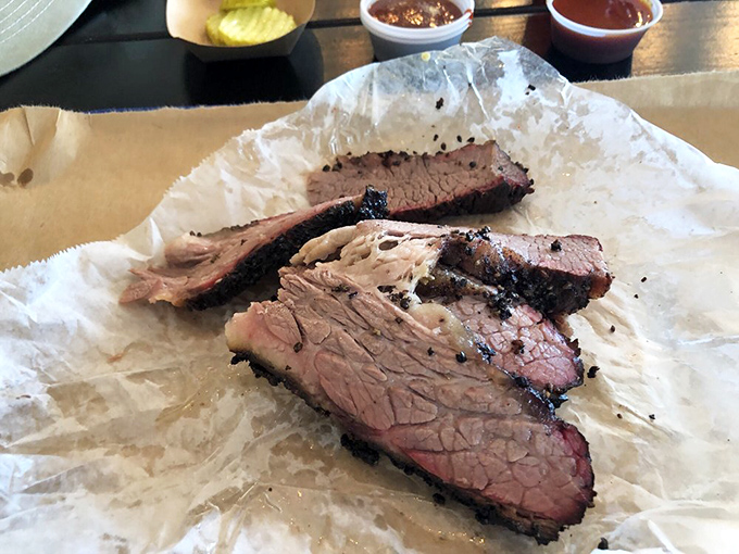 Behold the smoke ring of champions &ndash; this brisket looks like it graduated with honors from BBQ university.