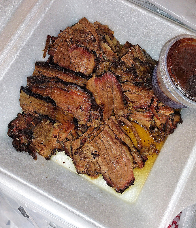 Brisket that doesn't need fancy plating to impress&mdash;just a container sturdy enough to hold all that smoky, tender glory.