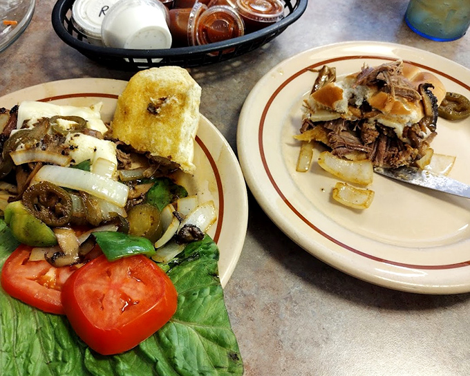 This isn't just lunch; it's a Midwest symphony &ndash; saut&eacute;ed peppers and onions dancing with tender brisket on a plate that screams "comfort food masterpiece."