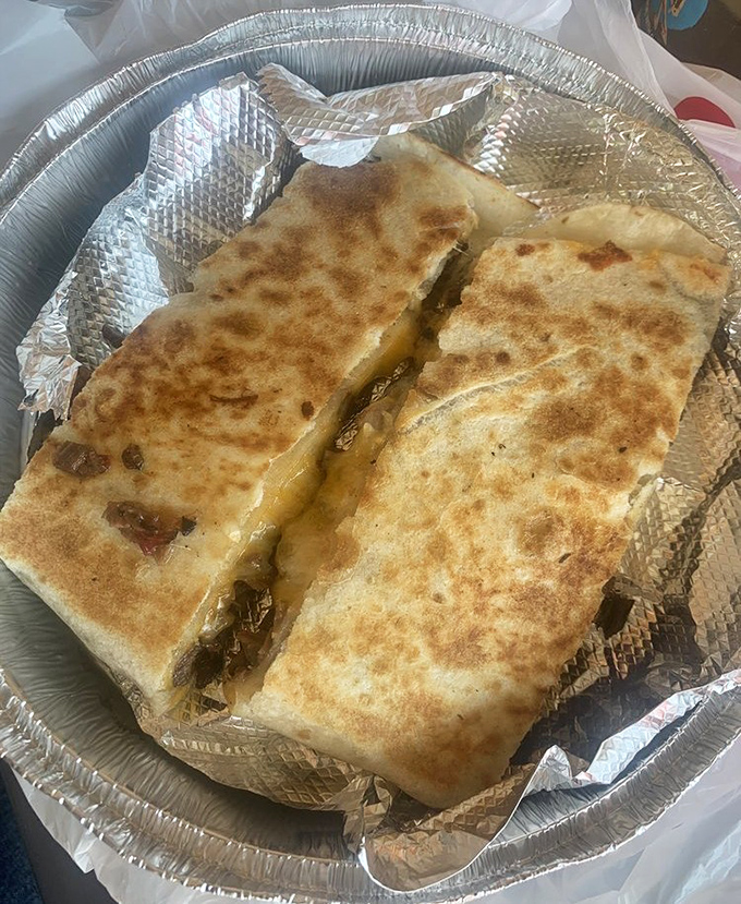 Cheese pulls for days! This quesadilla doesn't just satisfy hunger&mdash;it creates memories with perfectly browned tortillas hugging a treasure of meat and melted cheese.