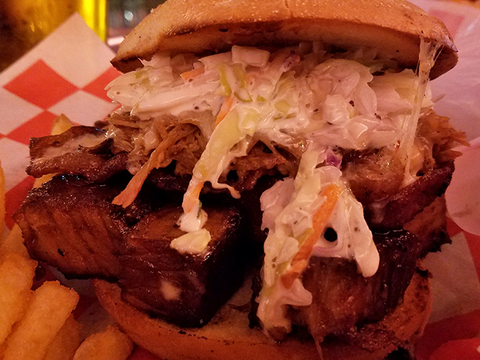 The brisket sandwich&mdash;where smoked beef meets cool slaw in perfect harmony. It requires a firm grip and zero shame about the sauce that will inevitably decorate your face.