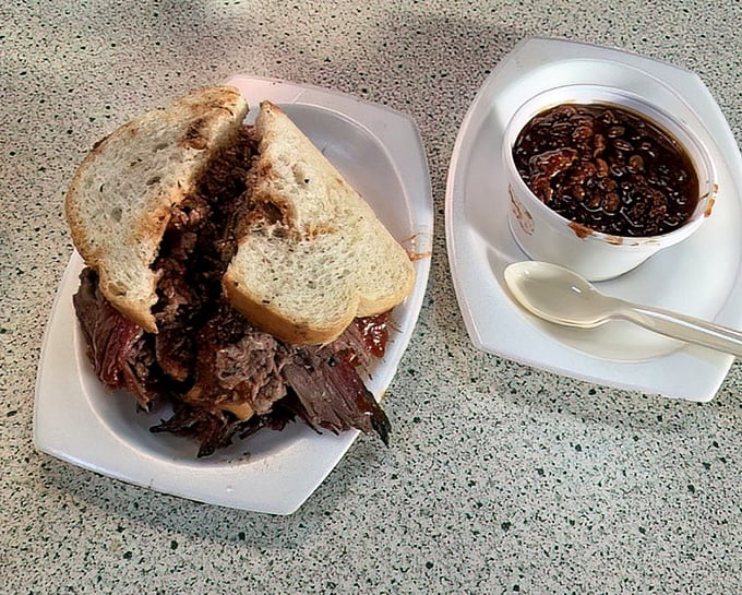 The sandwich that launched a thousand napkins. That perfect marriage of tender brisket and white bread is Kansas City's version of true love.