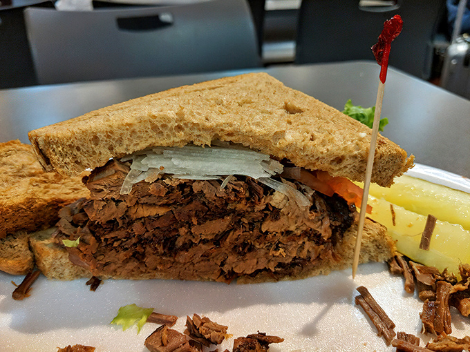 Brisket that doesn't need a passport to transport you to sandwich nirvana. Each slice tells a story of patience and proper cooking technique.