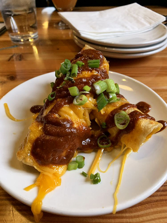 These aren't just enchiladas; they're a cross-cultural love story where Mexican tradition meets American barbecue in cheesy, saucy matrimony.