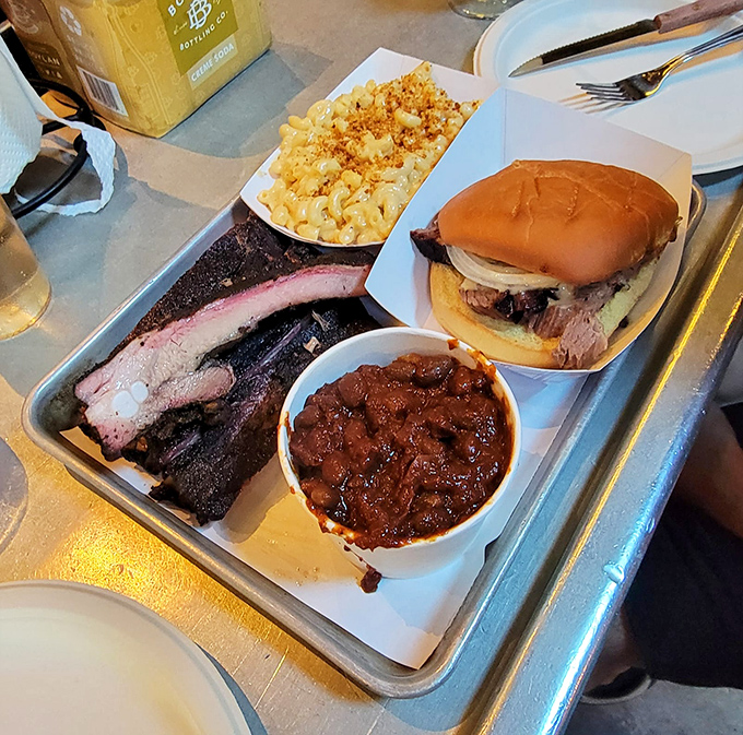 The holy trinity of barbecue bliss: brisket sandwich, burnt ends, and mac and cheese. Your diet called&mdash;it's taking the day off.