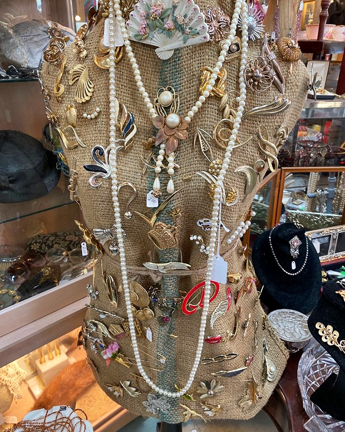 A burlap bust draped in vintage jewelry tells stories of elegant soir&eacute;es and special occasions from decades past. Each piece waiting for its second act.