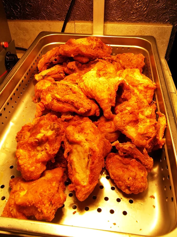 Golden-fried chicken that makes you wonder why anyone bothers with fancy food trends when perfection already exists in this crispy, juicy form.