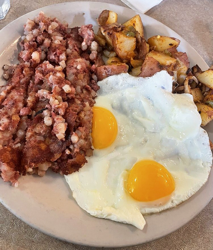 Corned beef hash and sunny-side-up eggs&mdash;a breakfast combination so perfect it should have its own national holiday and retirement plan.
