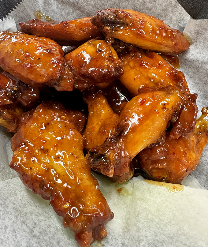 These wings aren't just glazed, they're practically lacquered with sticky-sweet sauce that'll have you licking your fingers with zero shame.