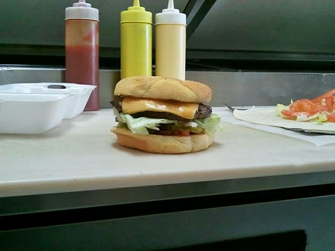 Simplicity at its finest: a perfectly grilled burger with melty cheese that doesn't need fancy aioli or artisanal buns to make your day better.