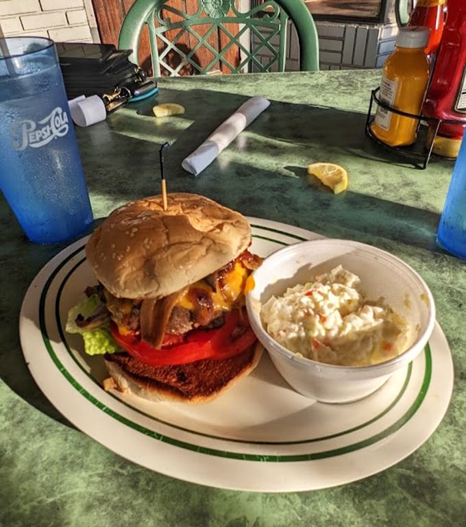 This isn't just a burger&mdash;it's an architectural achievement of beef, cheese, and toppings that somehow maintains its structural integrity until the last delicious bite.