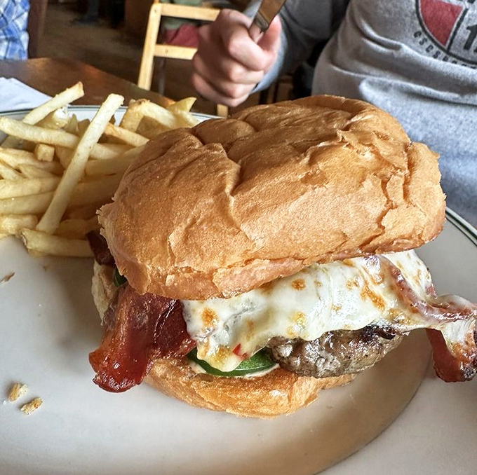 A burger so glorious it deserves its own anthem. The melted cheese and bacon are performing a duet that would make Broadway jealous.