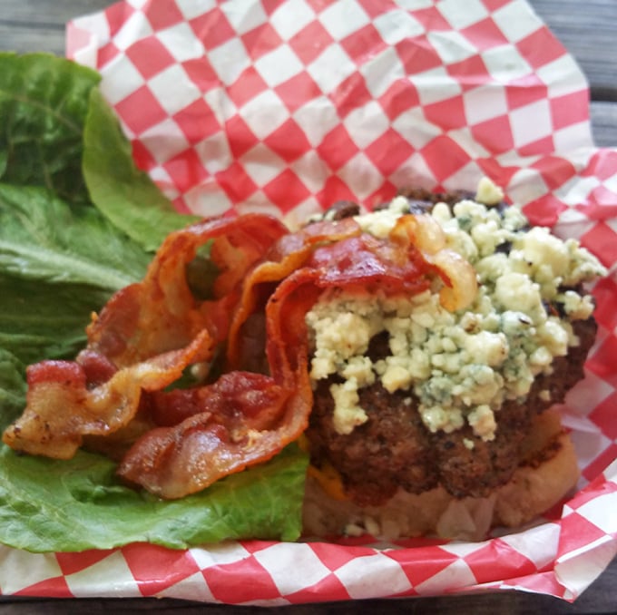 This isn't just a burger; it's a masterclass in beef architecture. Blue cheese and bacon create a symphony of savory satisfaction.