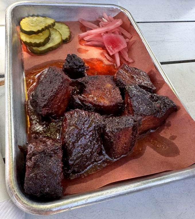 Burnt ends: where brisket goes to heaven. These glistening cubes of meat candy are worth every minute of their extended smoke bath.