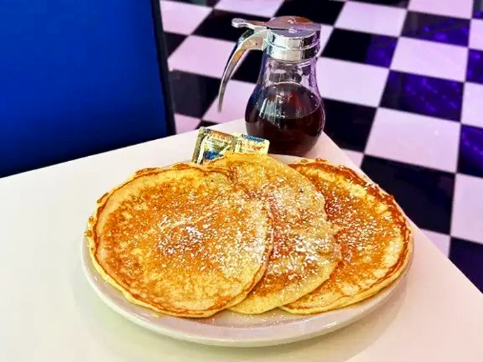 Pancakes so fluffy, they could double as pillows for your food coma afterward.