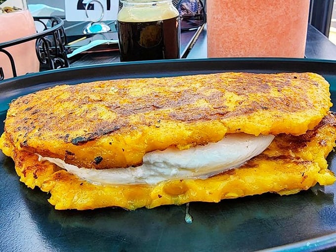 The cachapa's golden exterior gives way to a melty cheese center&mdash;like a Venezuelan version of grilled cheese that makes American singles hang their heads in shame.