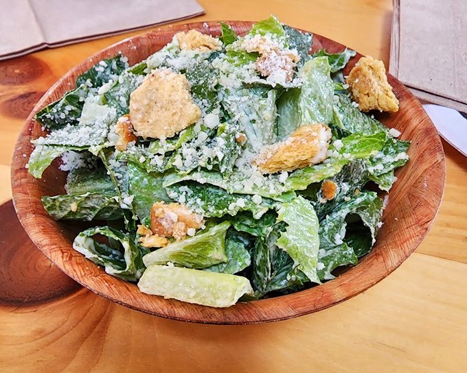 This Caesar salad isn't just killing time until the pizza arrives&mdash;it's a crisp, creamy masterpiece that deserves its own spotlight in the culinary drama.