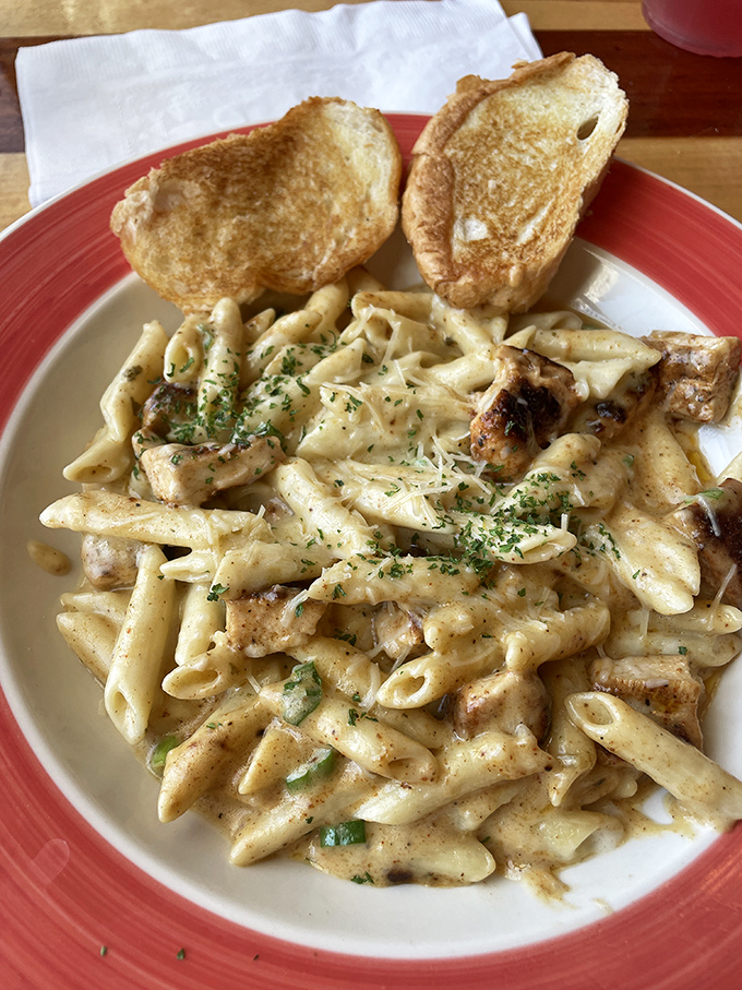 Pasta in a seafood restaurant? When it's this creamy and loaded with perfectly seasoned chicken, even the fish understand the temptation.