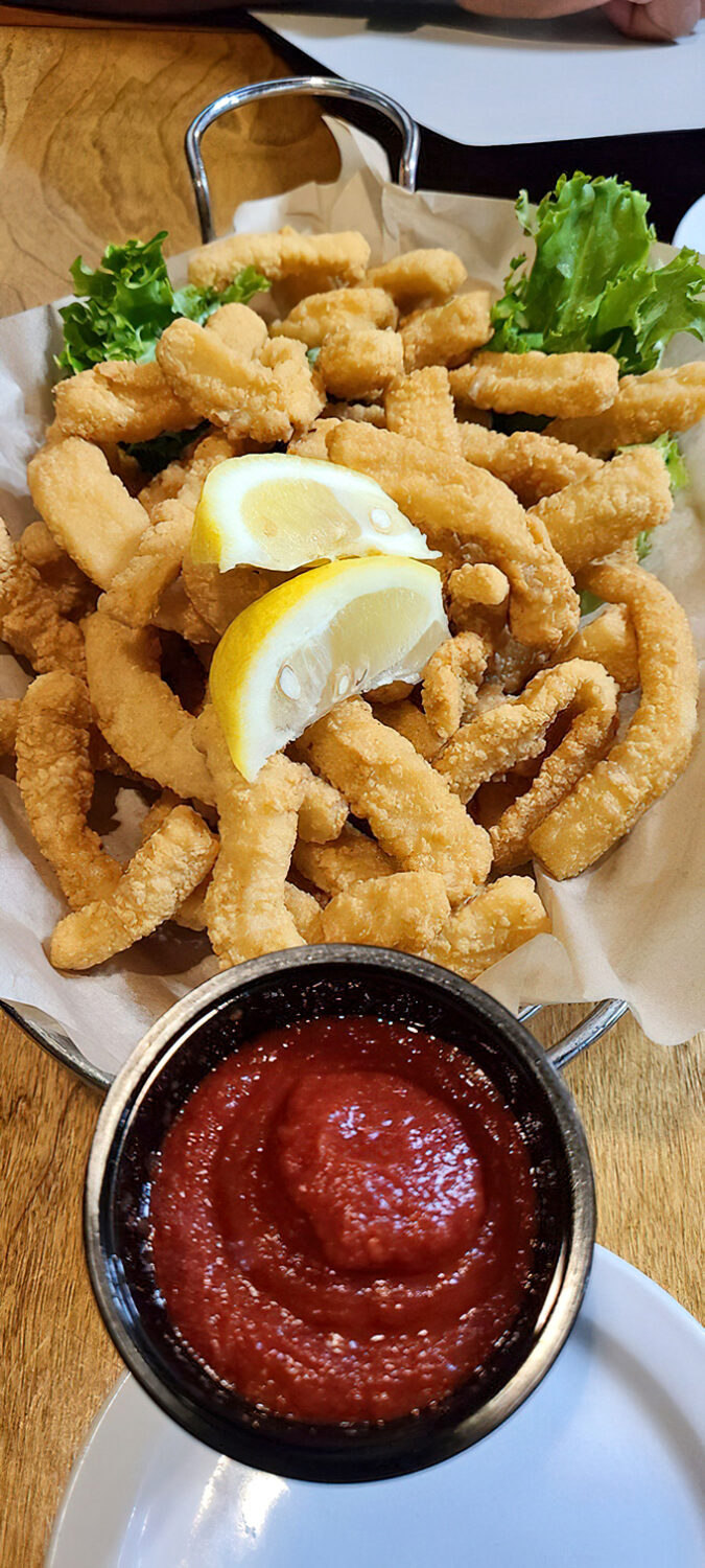 Golden, crispy calamari that shatters with each bite, served with marinara that's clearly on a first-name basis with fresh tomatoes and garlic.