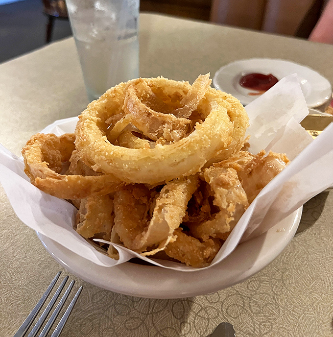 These onion rings aren't just appetizers&mdash;they're golden halos of crispy perfection. Forget sharing, you'll want these all to yourself.