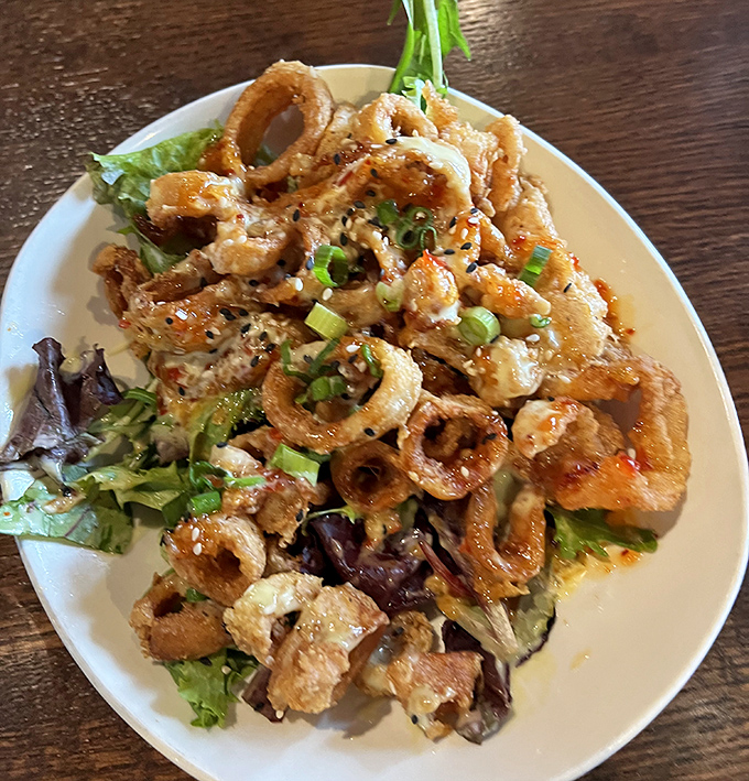 Calamari that doesn't know it's in Ohio &ndash; crispy, tender rings nestled on greens with a sauce that makes you forget you're hundreds of miles from any ocean.