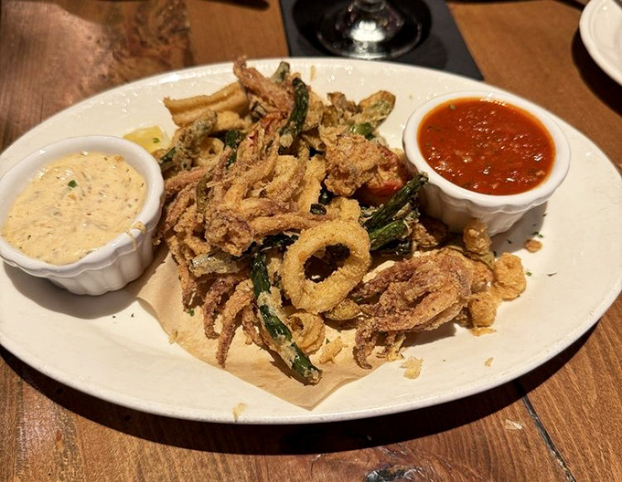 Crispy calamari that doesn't require the jaw strength of a crocodile. The dipping sauces are the supporting actors who deserve their own Oscar.
