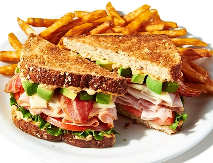 The club sandwich &ndash; architecture you can eat, where each layer tells a different story and avocado makes everything better, as it does in life.