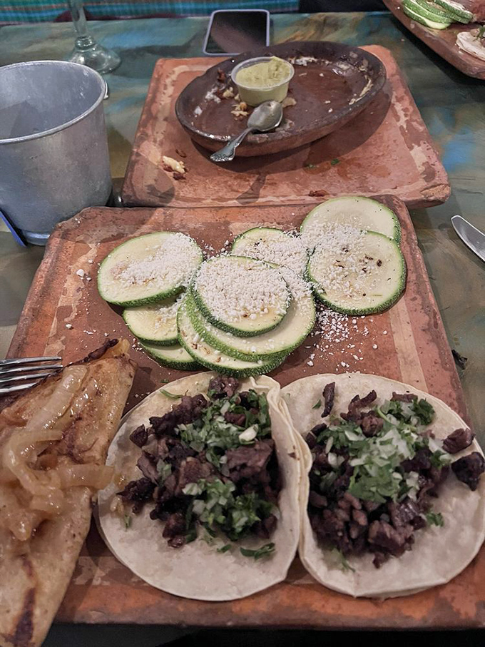 Simple yet sublime: tender carne asada tacos with fresh toppings on a rustic clay plate. Sometimes the classics become classics for good reason.