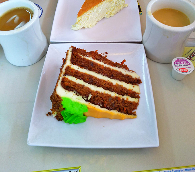 Layer upon layer of moist carrot cake with cream cheese frosting. Diet plans come here to die a deliciously sweet death.