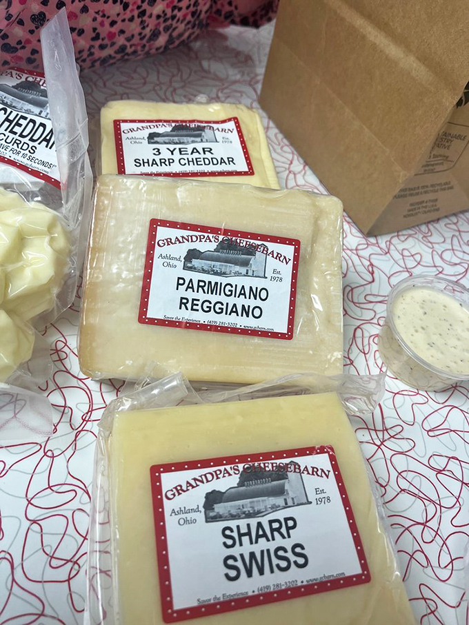From sharp cheddar to Parmigiano Reggiano, this cheese selection spans continents and flavor profiles with impressive dedication.