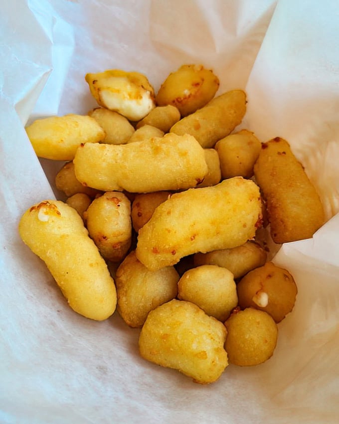 These cheese curds aren't just fried&mdash;they're transformed into golden nuggets of joy that make grown adults giggle with delight.