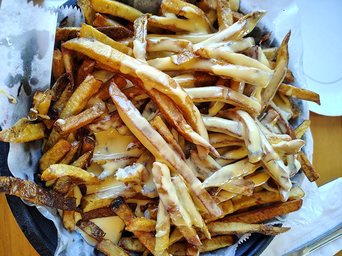 Mount Vesuvius has nothing on this golden volcano of cheese-covered fries &ndash; prepare for delicious destruction.